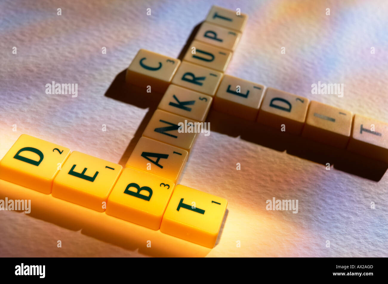 SCRABBLE BOARD GAME LETTERS SPELLING BANKRUPT CREDIT DEBT Stock Photo ...