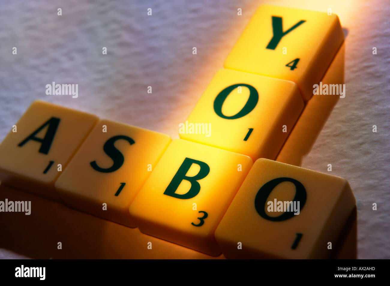 SCRABBLE BOARD GAME LETTERS SPELLING ASBO YOB Stock Photo - Alamy