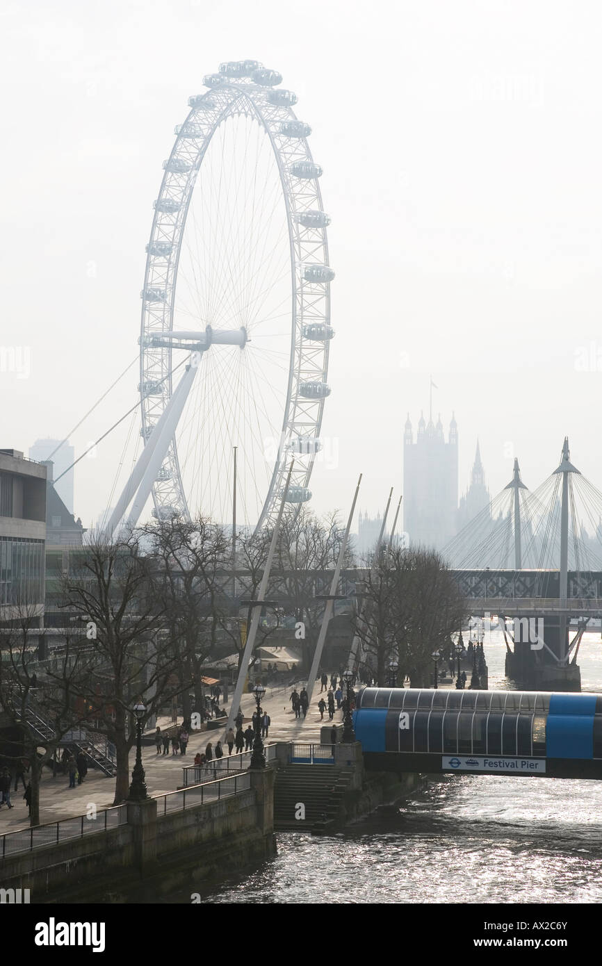 View of the London Eye from the South Bank on Waterloo Bridge looking ...