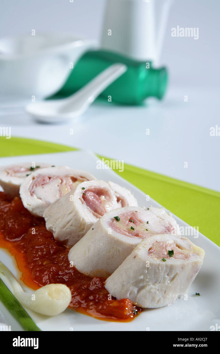 Chicken rolls with ham and cheese Stock Photo - Alamy