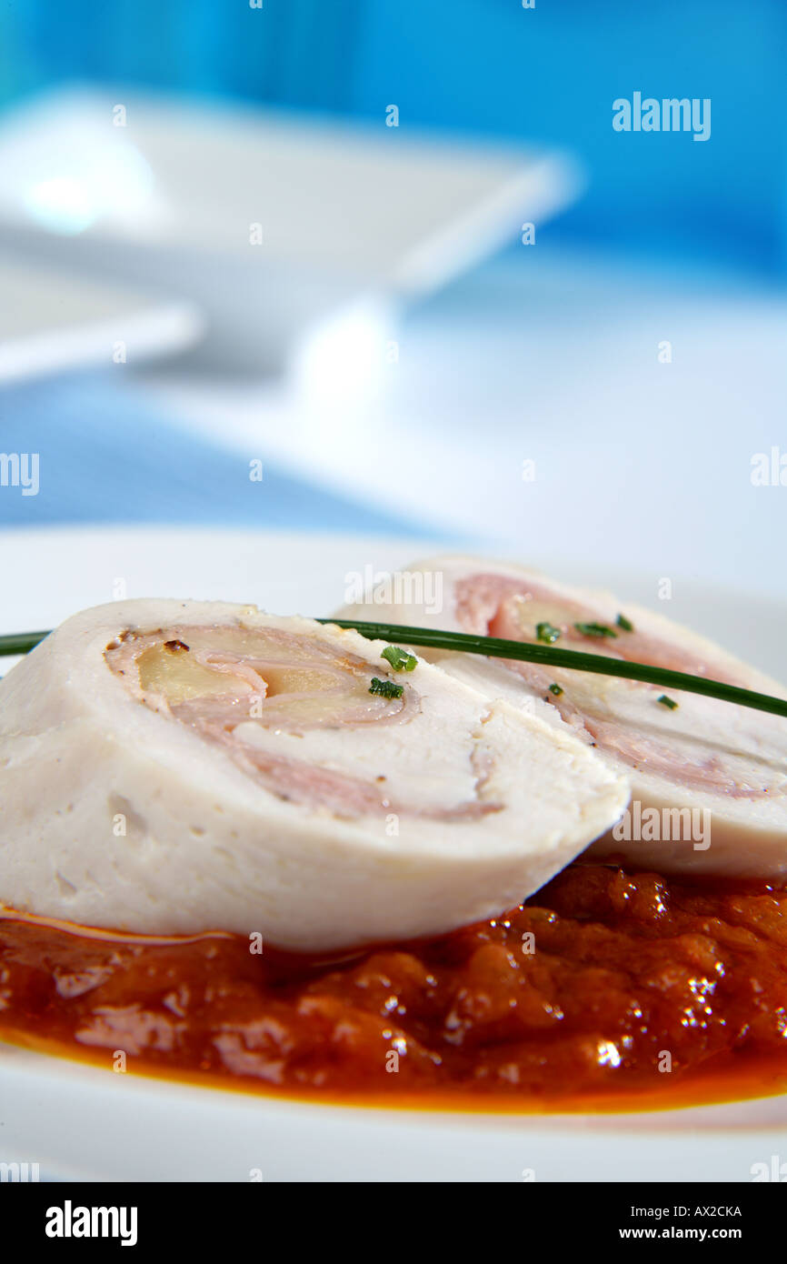 Chicken rolls with ham and cheese Stock Photo - Alamy