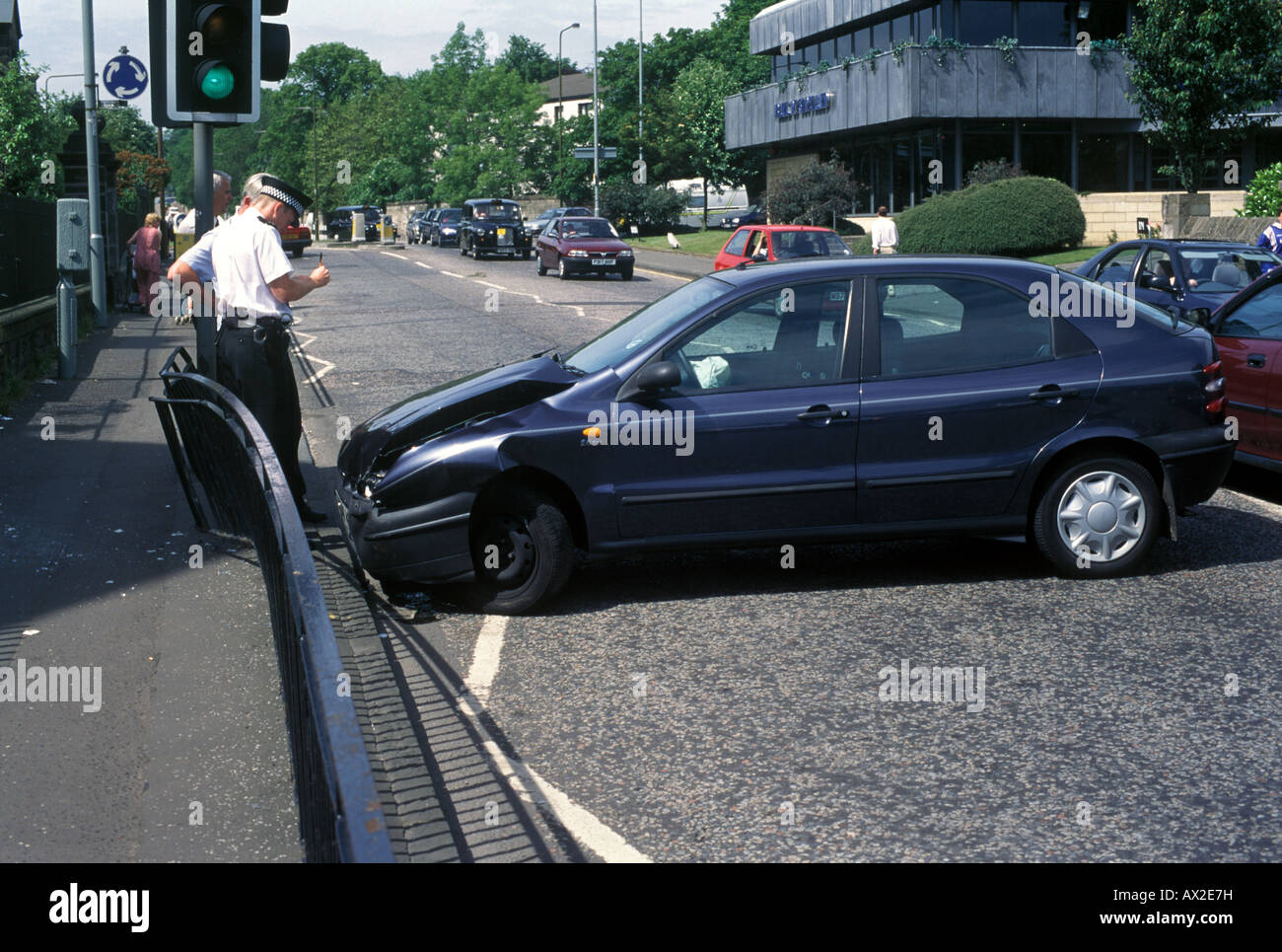 A car which has crashed into railings Stock Photo - Alamy