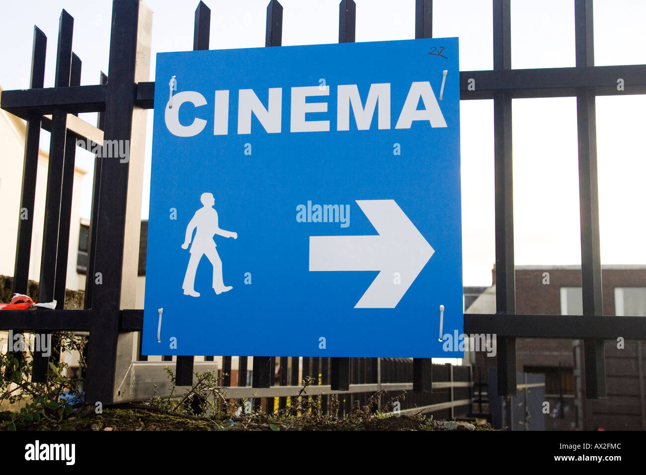 a sign showing directions to a cinema Stock Photo - Alamy