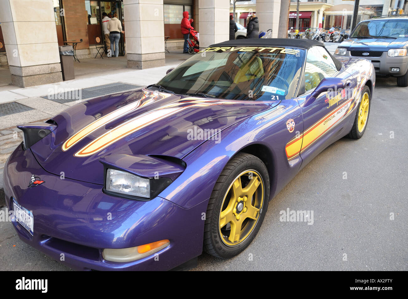 A shiny racing car parked on the street in Battery Park City, a ...