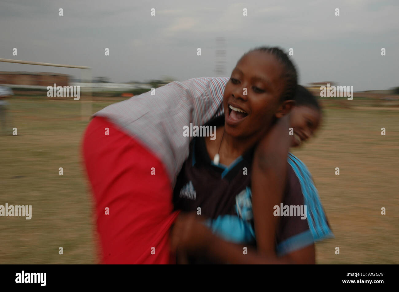 Two of Rwanda's young women rugby players train before a match by ...
