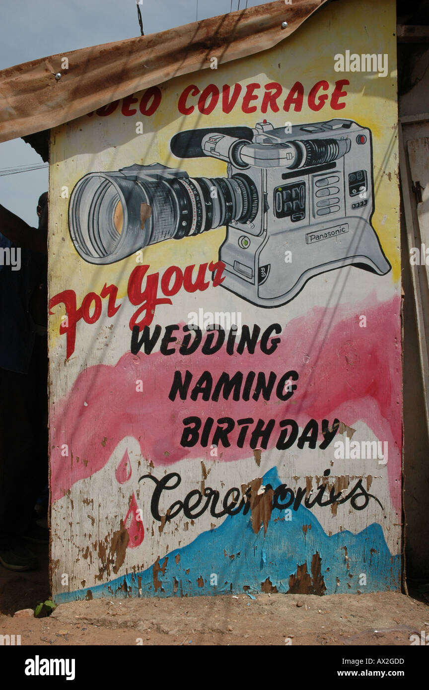 Modern African art on a shop wall The Gambia West Africa. Advertising ...