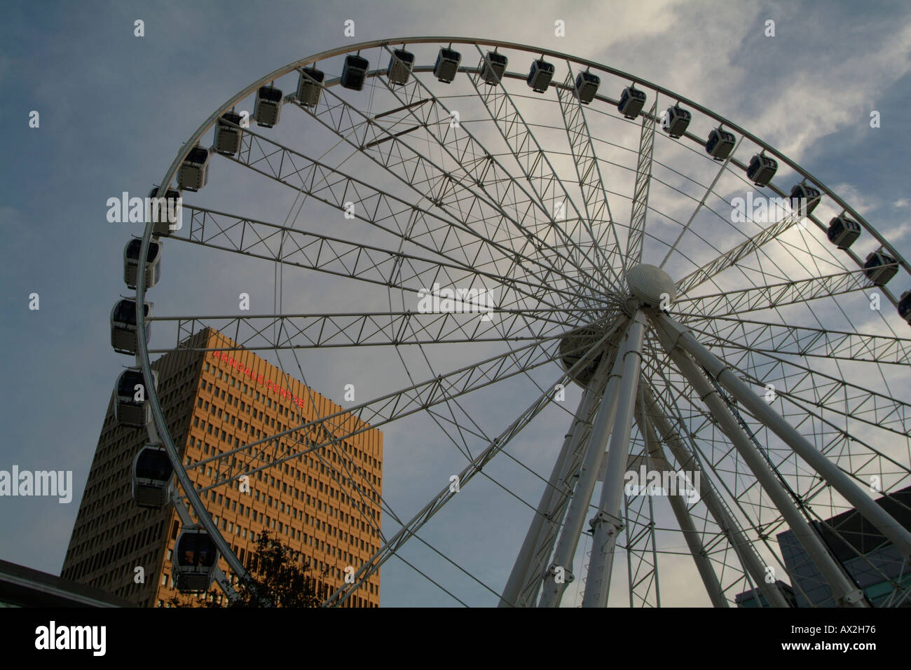 Sunley Tower and Millennium Wheel Piccadilly Square Stock Photo - Alamy