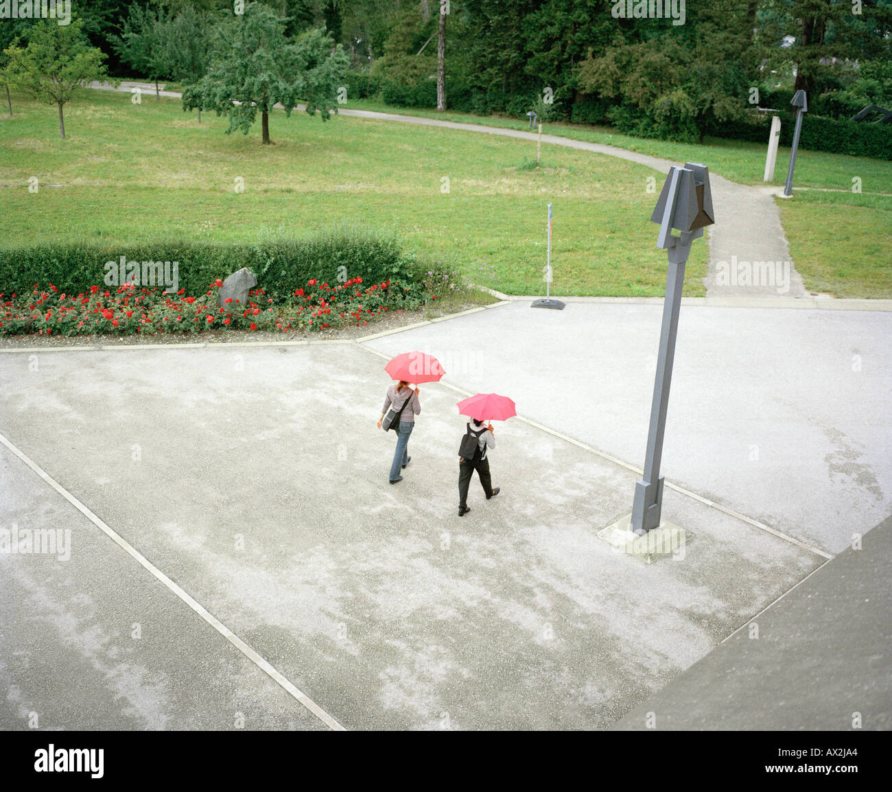 Walking with umbrellas hi-res stock photography and images - Alamy