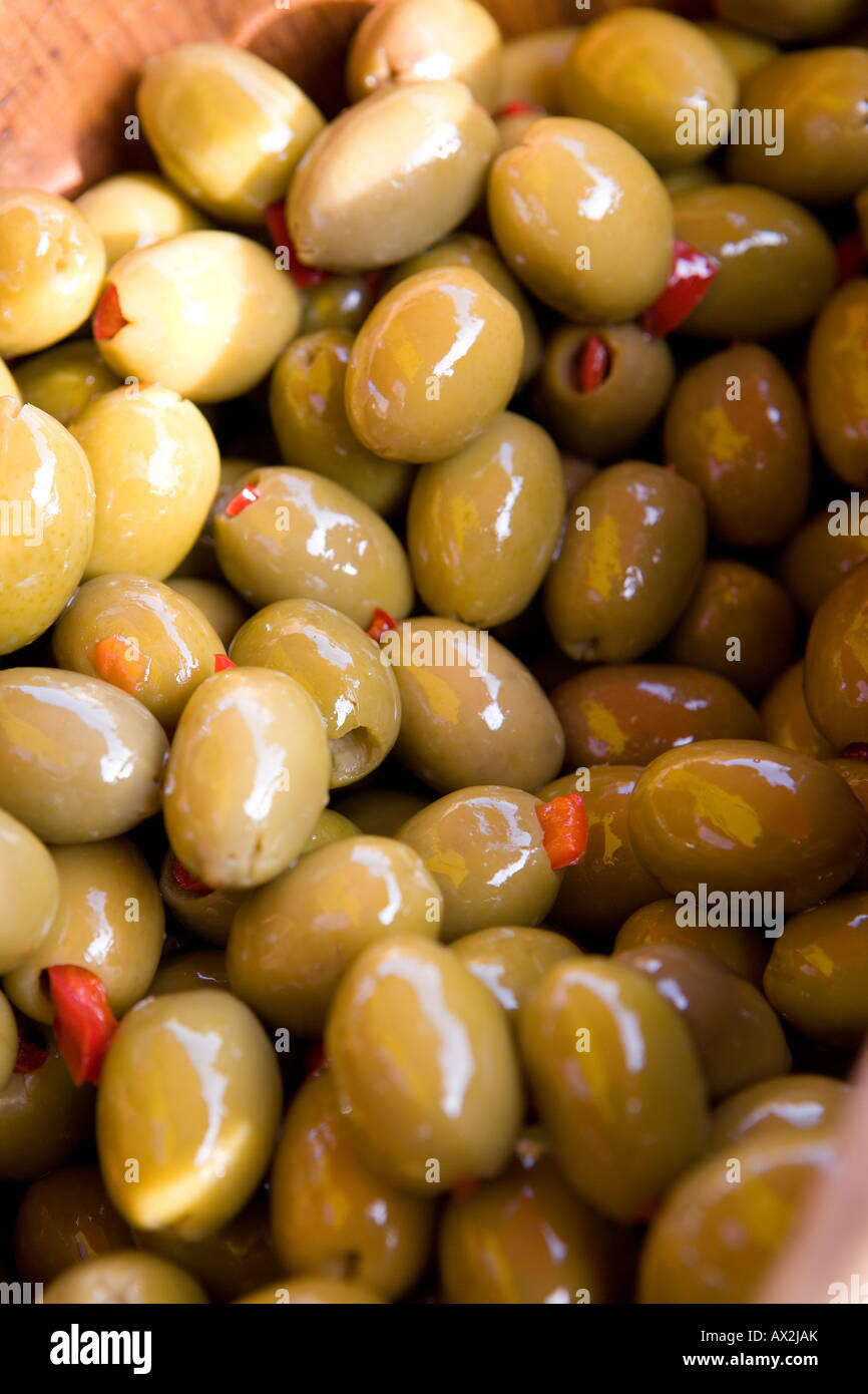 An assorted bowl of Olives waiting to be purchased at a farmers Market ...