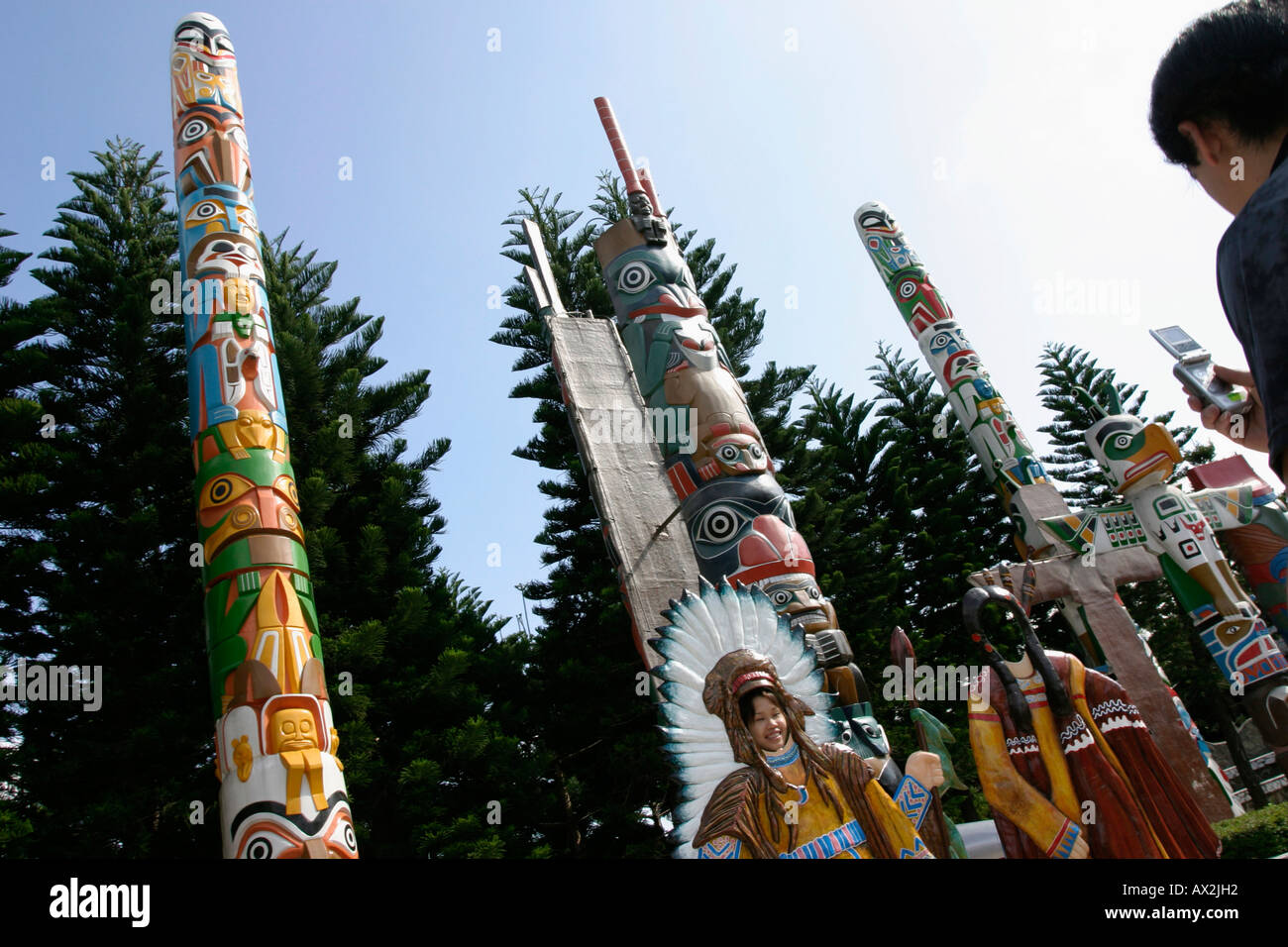 People taken pictures with Indian column Stock Photo - Alamy