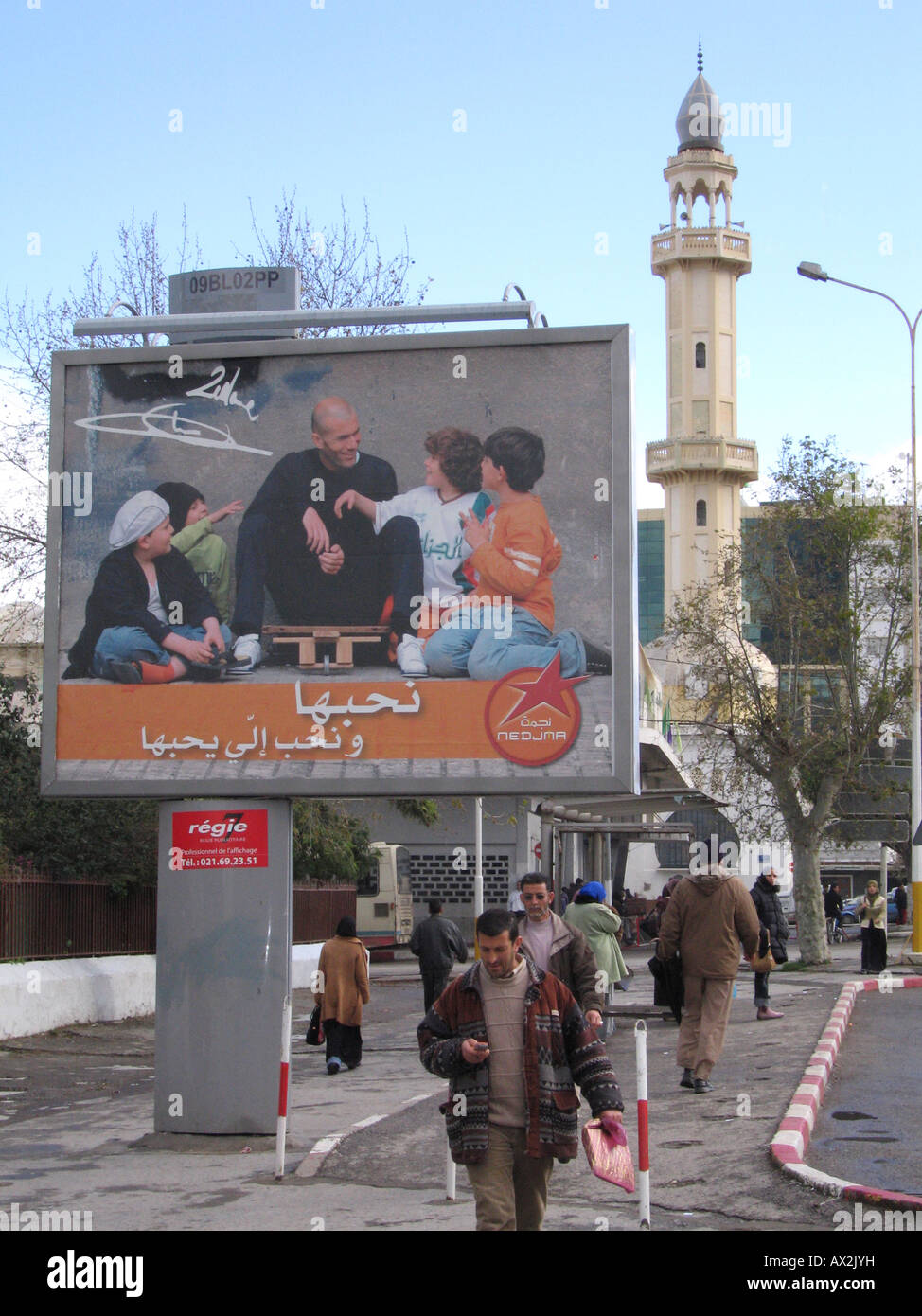 Street view with advertising panel with the famous french soccer player ...