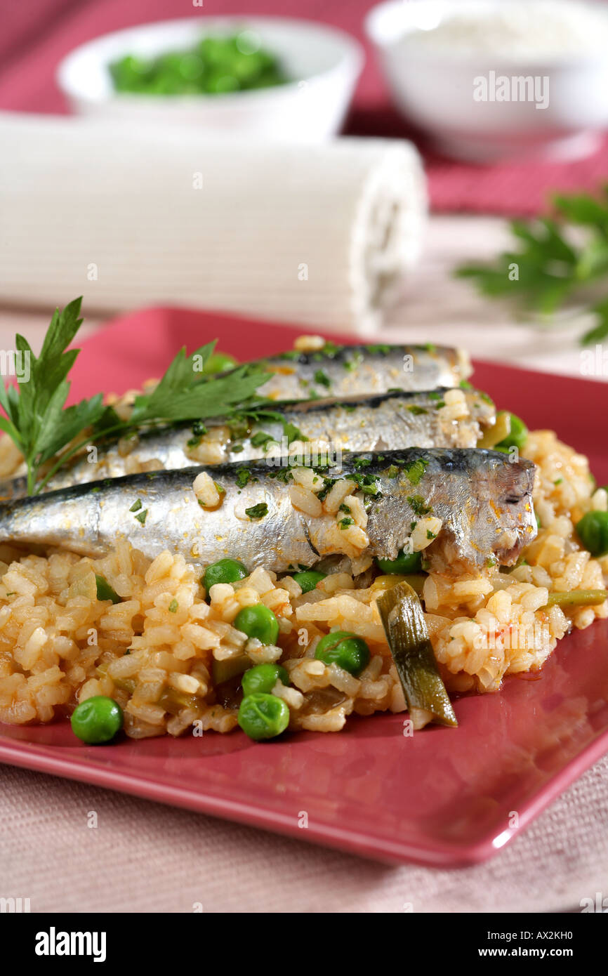 Rice with sardines Stock Photo - Alamy