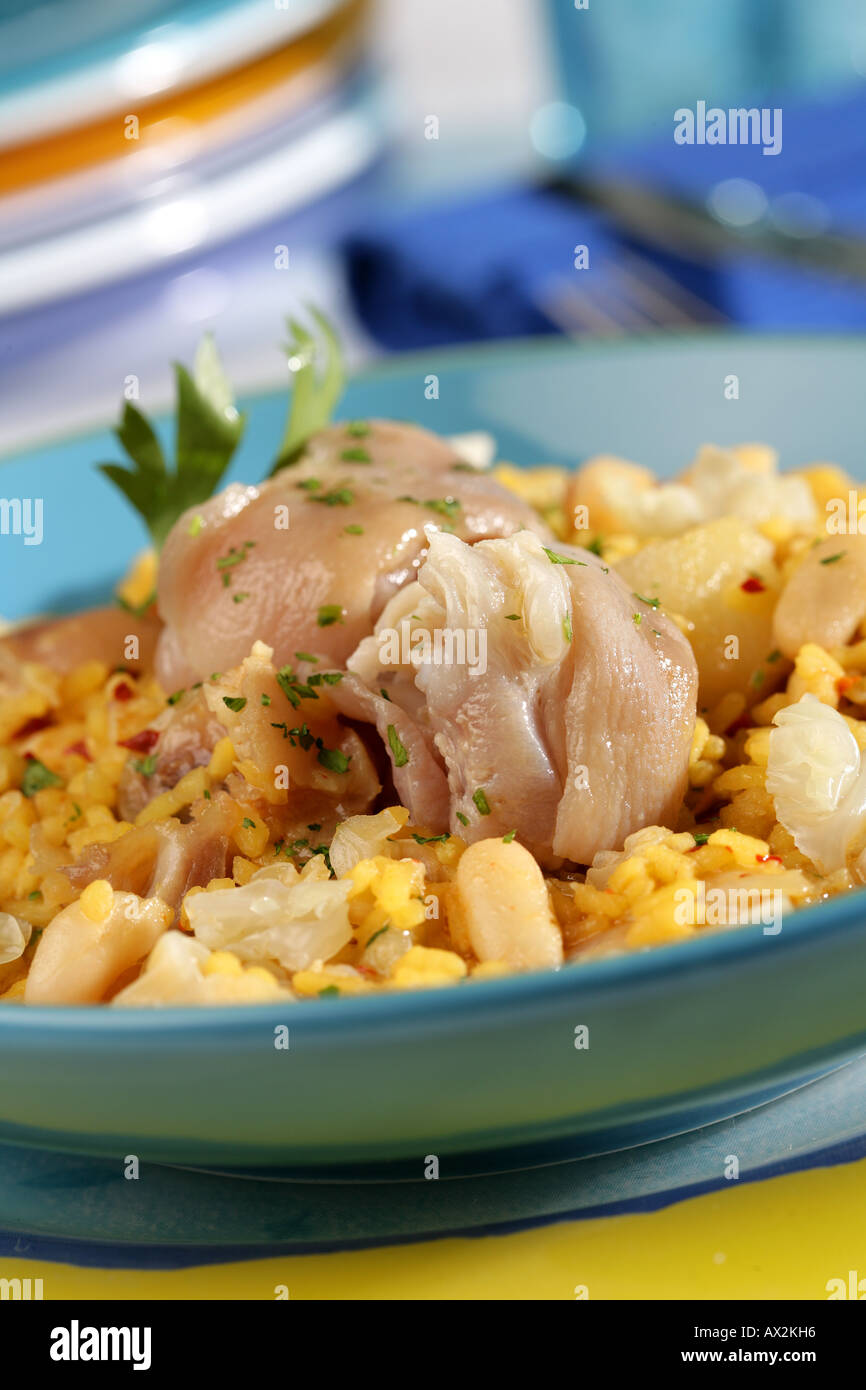Rice with pig trotters beans and turnips Stock Photo - Alamy