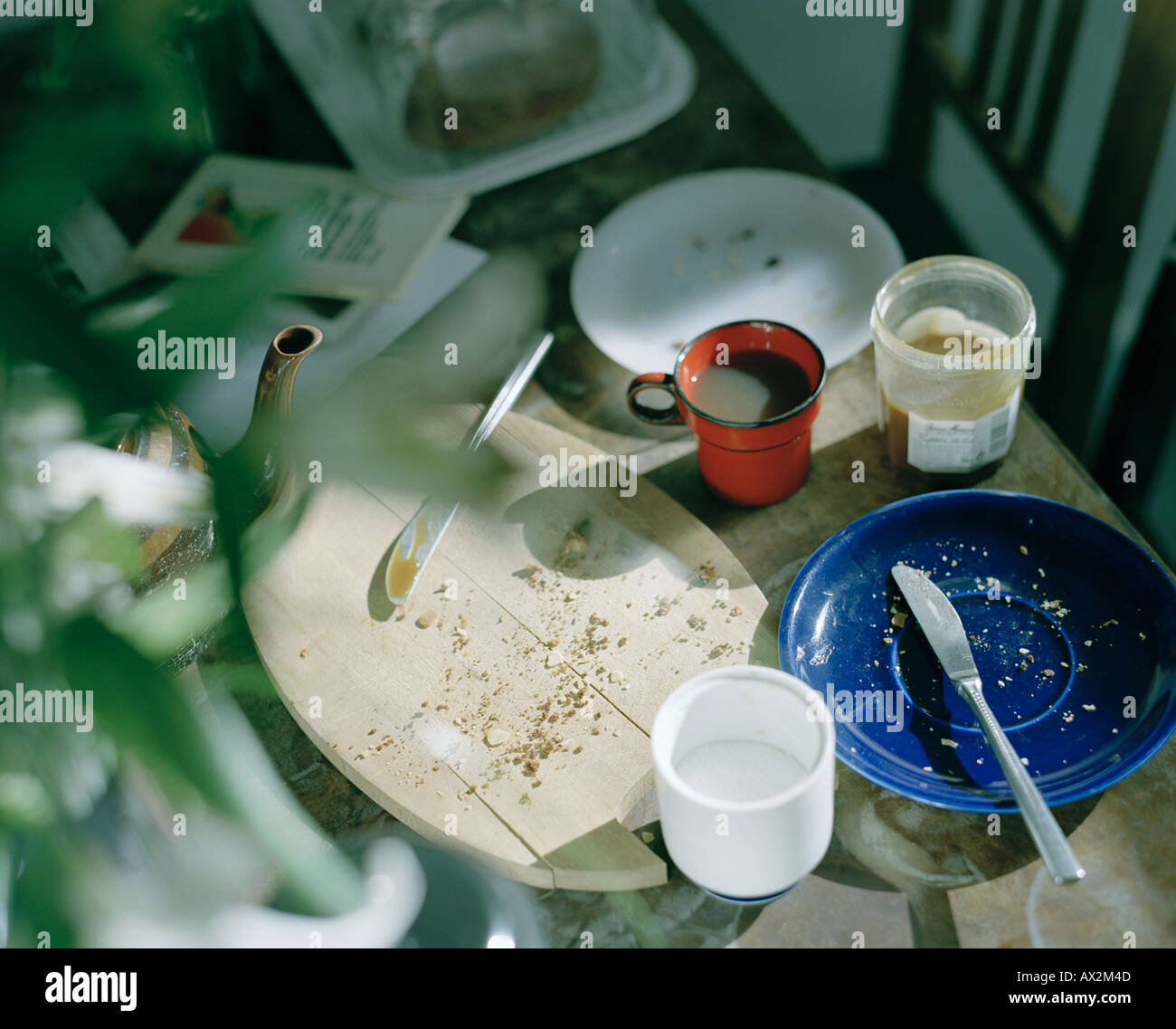 A messy breakfast table Stock Photo - Alamy