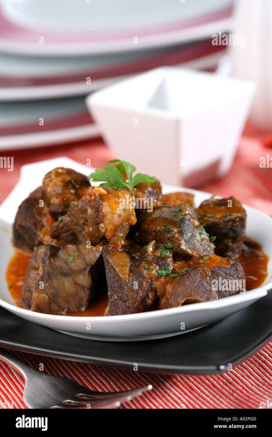 Deep fried veal heart with romesco sauce Stock Photo - Alamy