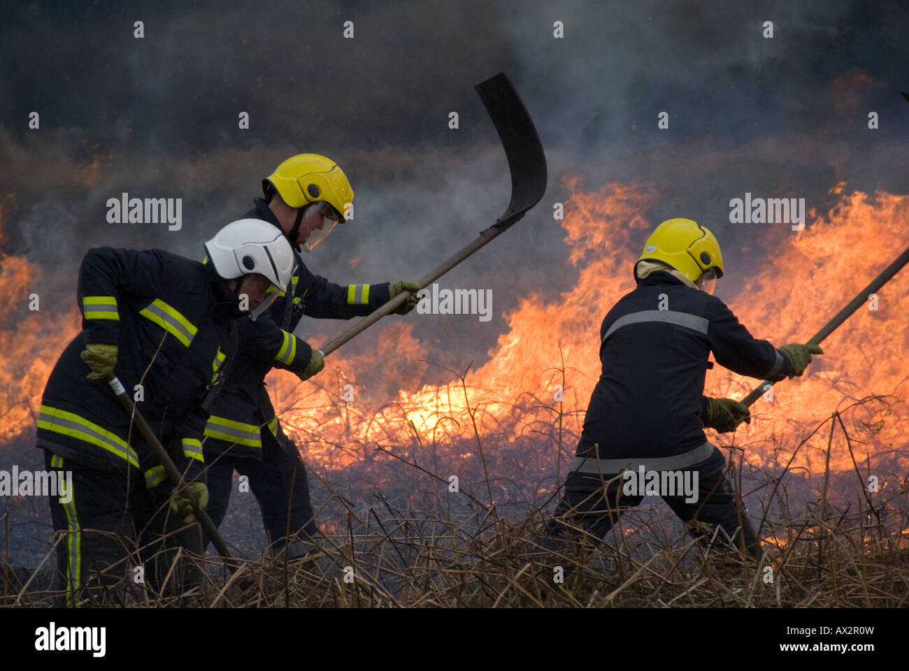 Firefighters tackling a brush fire at the historic Roche Rock, St ...