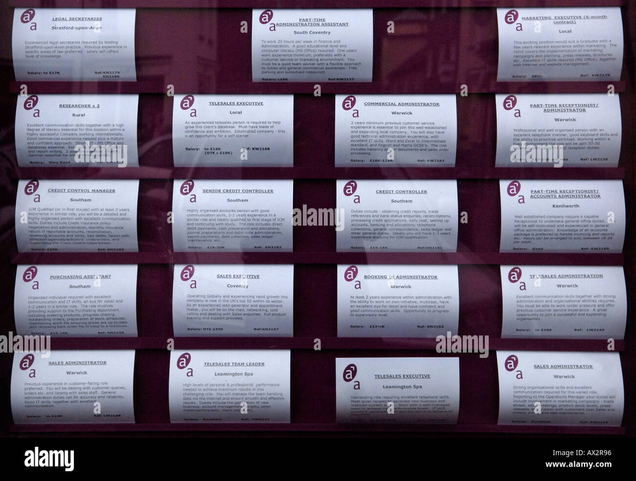 Advertisements in the window of a recruitment agency Stock Photo - Alamy