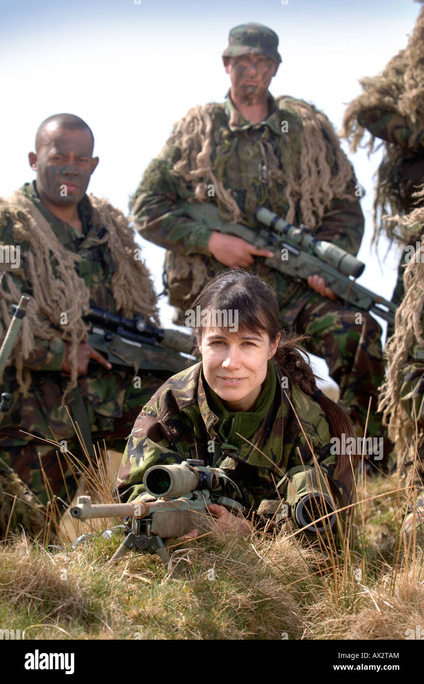 A BRITISH ARMY FEMALE RECRUIT AT A FIRING RANGE IN BRECON WALES DURING ...