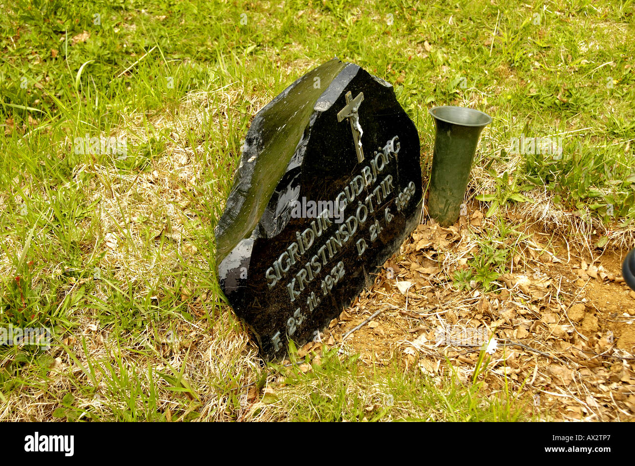 Gravestone made of volcanic glass obsidian in Haukadalur Iceland Stock ...