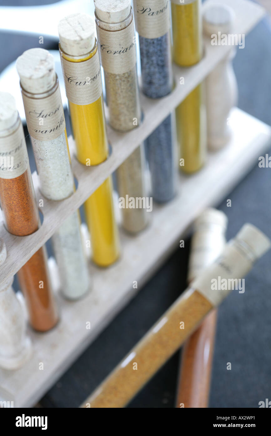 Spices sampler in test tubes on a wooden stand Stock Photo - Alamy