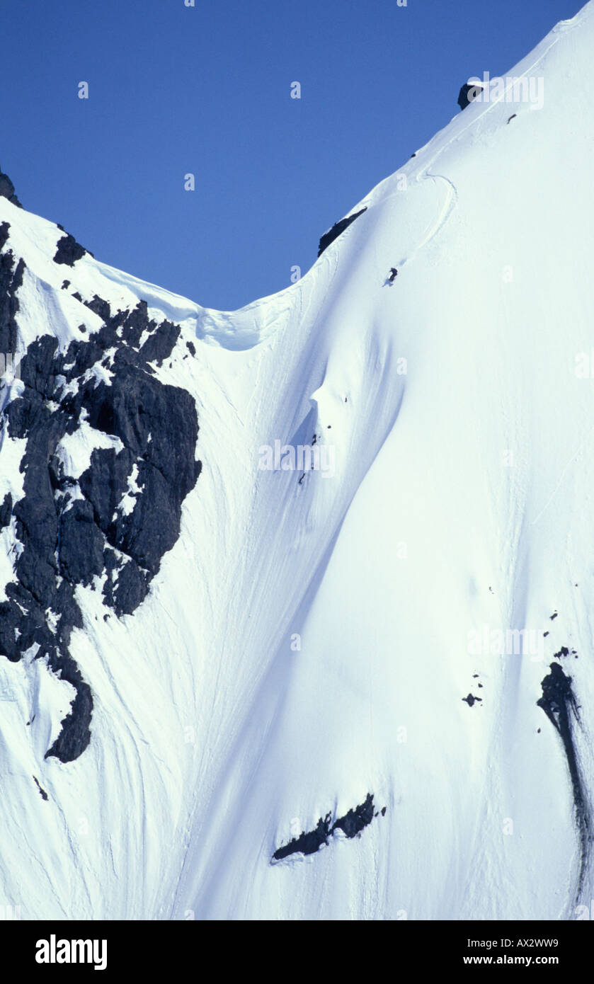 Snowboarder in steep slope hi-res stock photography and images - Alamy