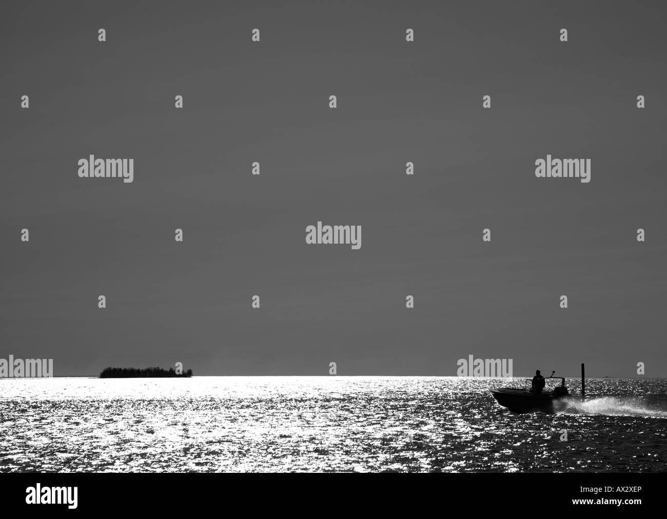 Black and white image of a man boating at sea , Finland Stock Photo - Alamy