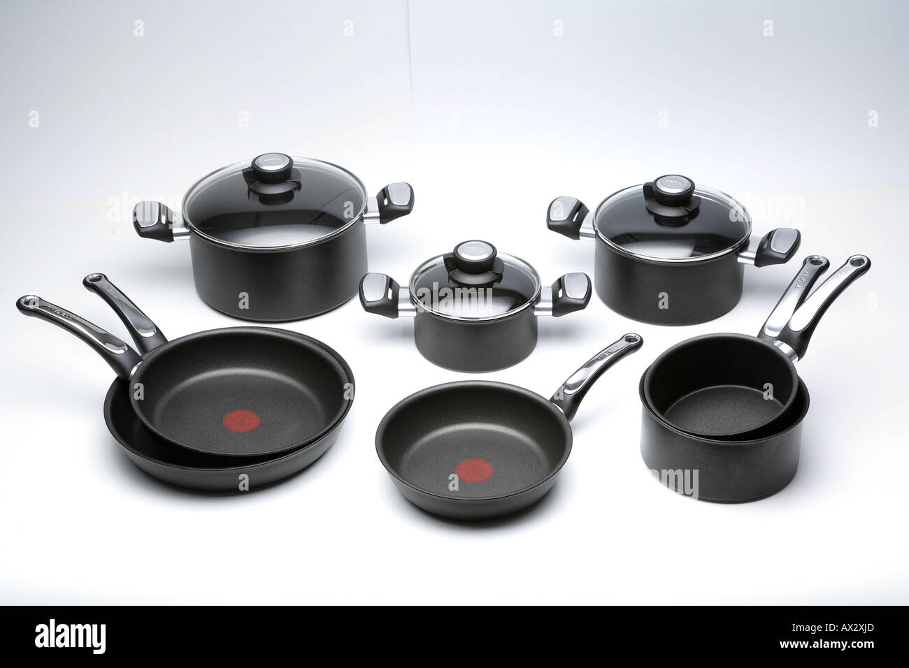 Nonstick kitchenware still life on white background Stock Photo - Alamy