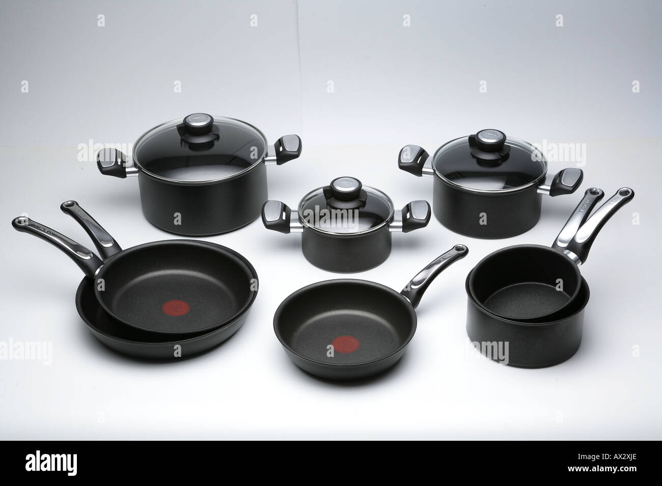 Nonstick kitchenware still life on white background Stock Photo - Alamy