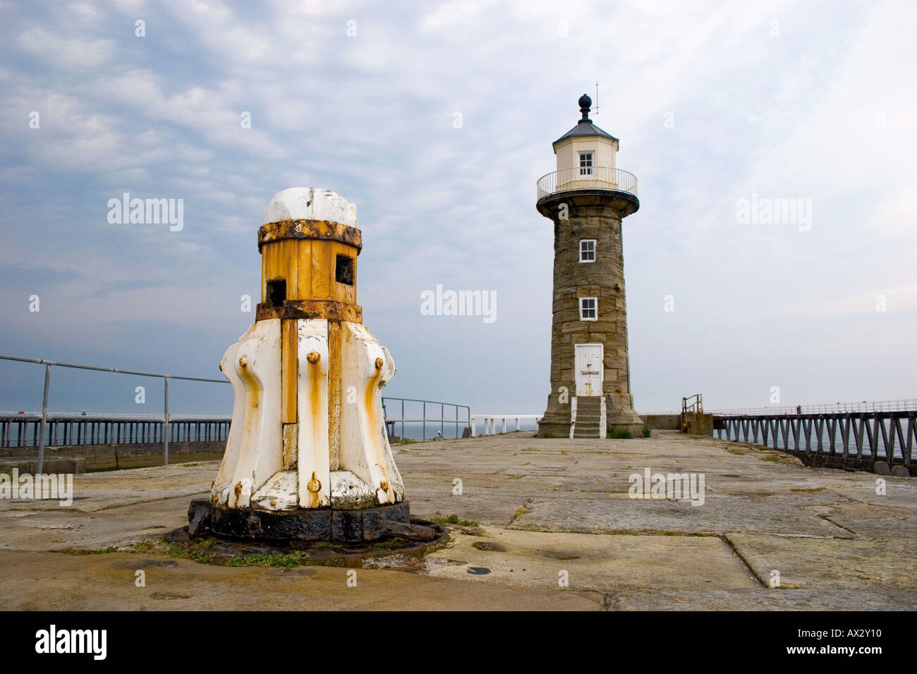 The lighthouse and pier at Whitby Harbour Stock Photo - Alamy