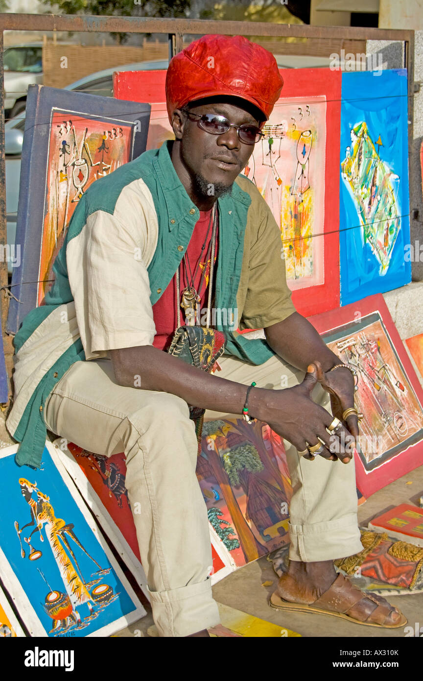 Travel, Senegal, Dakar, Local man, Coco the artist with his paintings ...
