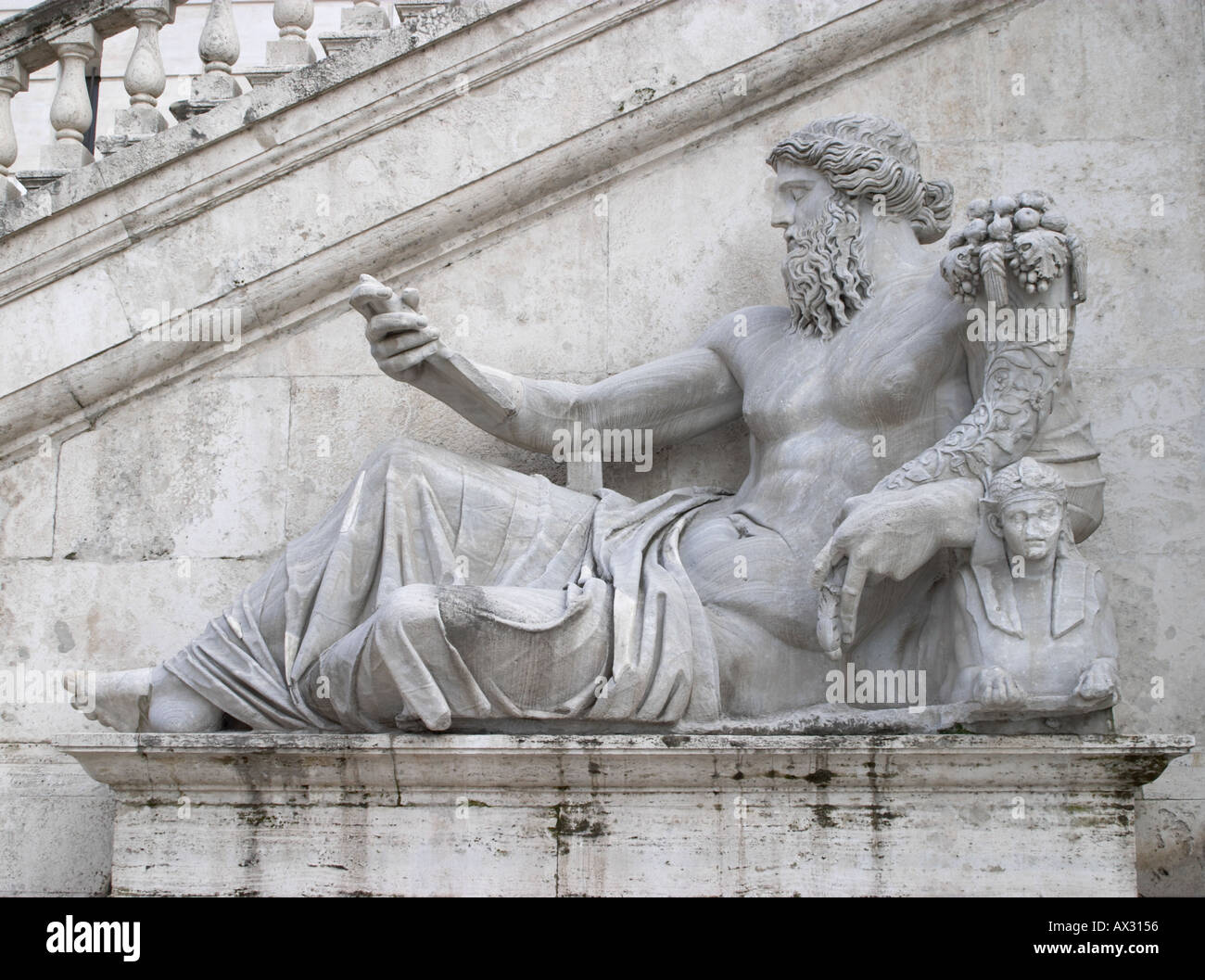 Statue of a reclining figure in Piazza del Campidoglio Rome Stock Photo ...