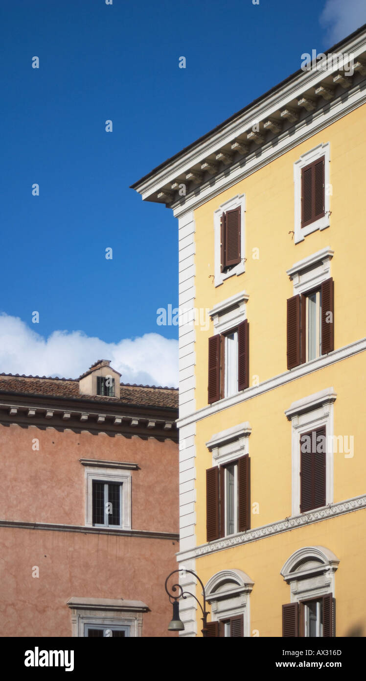 Windows and coloured walls in Rome Stock Photo - Alamy