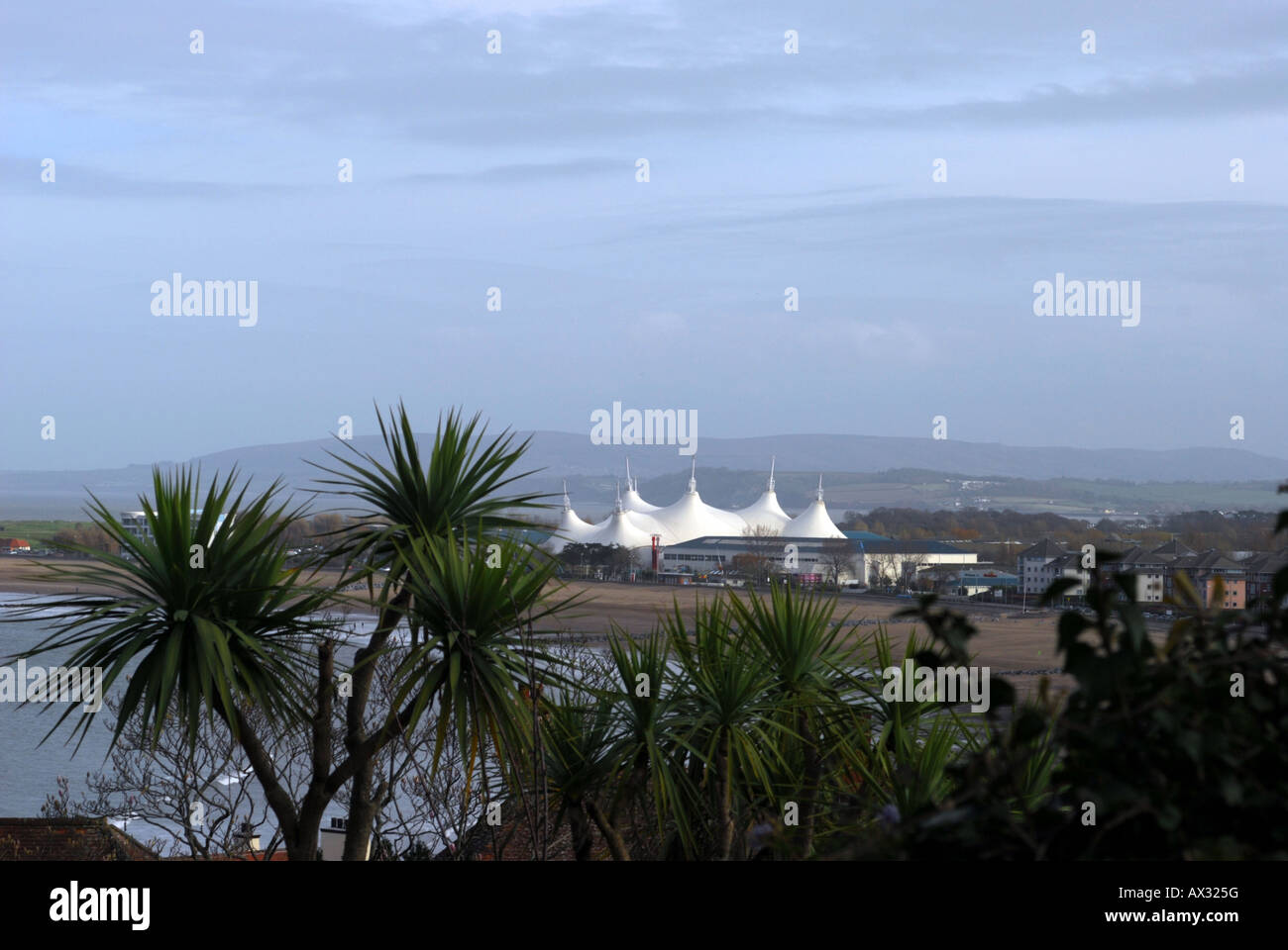Distant view of Butlins Holiday complex viewed through Palm Trees on ...