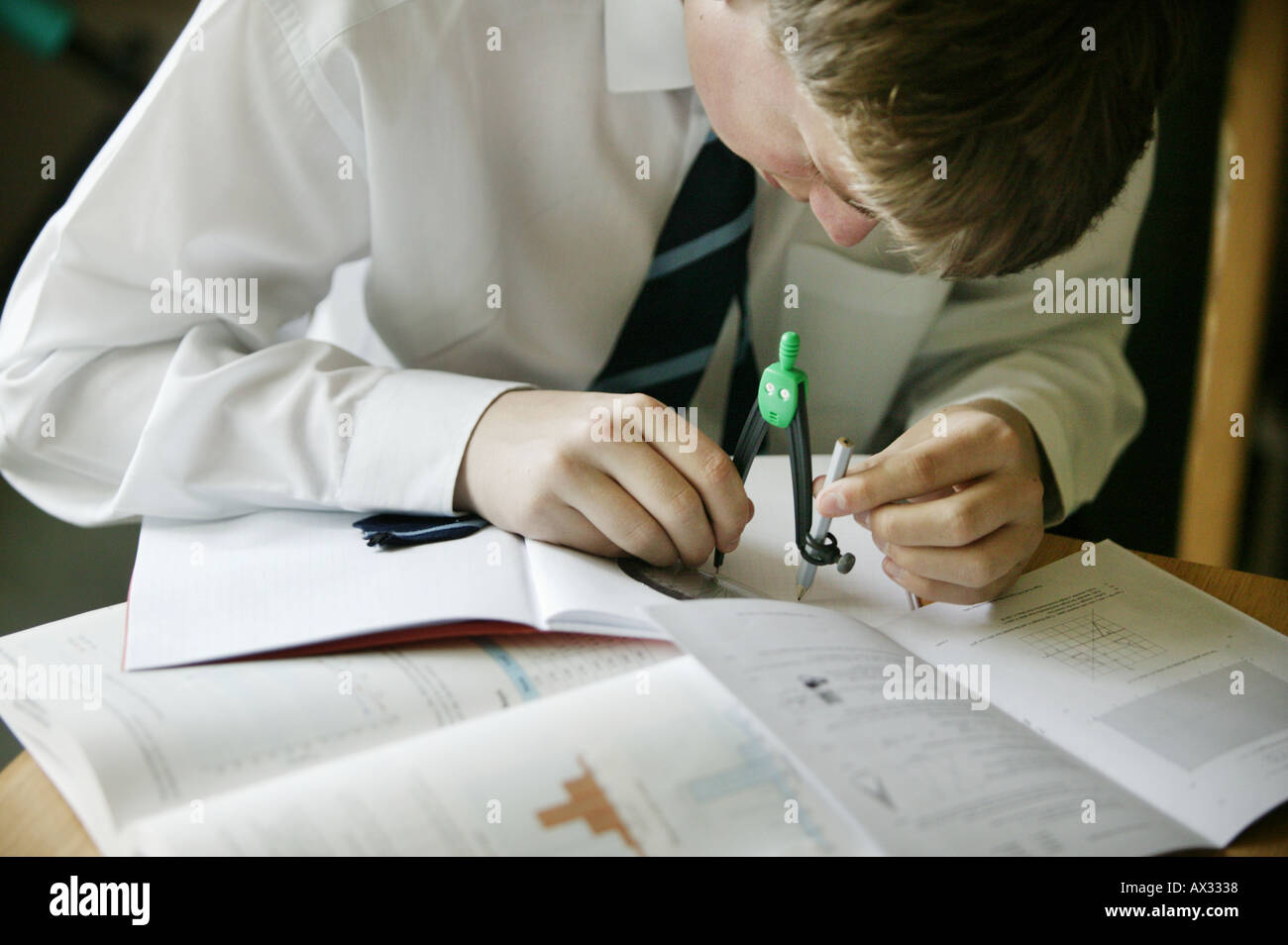Mathematics lesson for a secondary school pupil in the UK Stock Photo ...