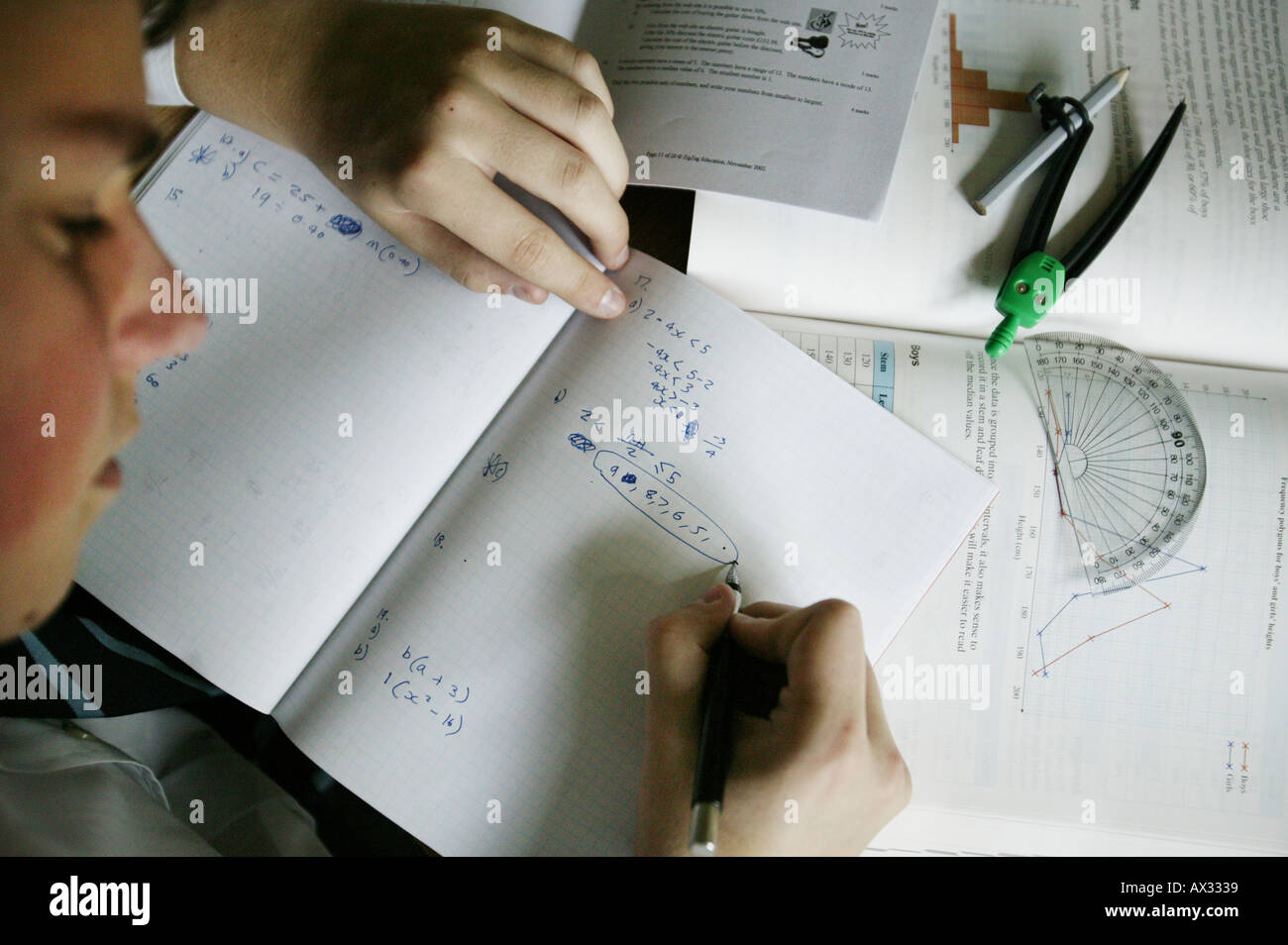 Mathematics lesson for a secondary school pupil in the UK Stock Photo ...