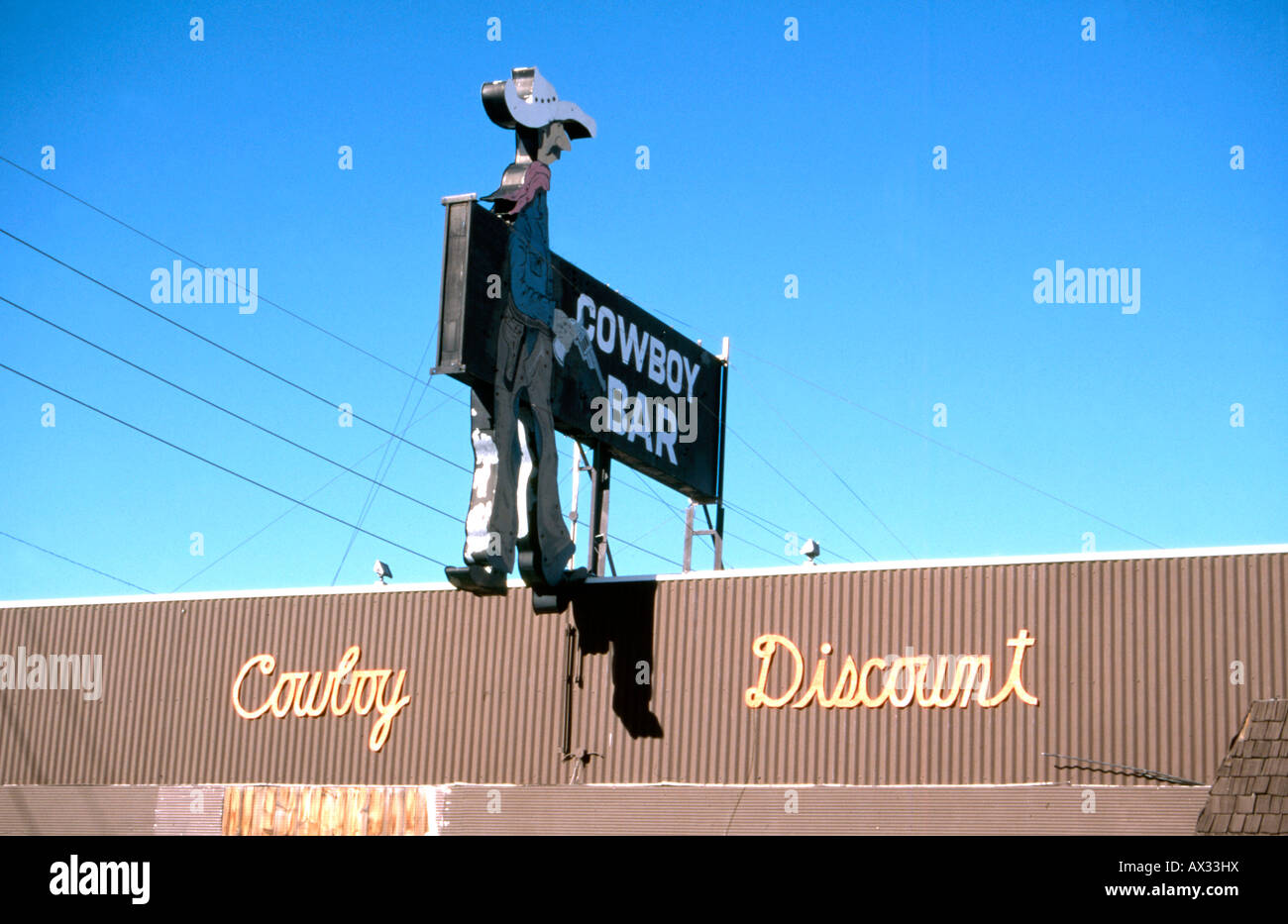 Sign for cowboy bar in US town Stock Photo - Alamy