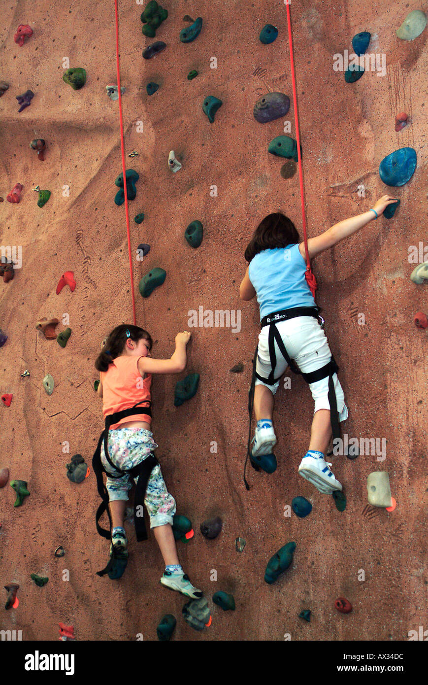 Kids Climbing the Wall at Indoor Recreation Facility Stock Photo - Alamy
