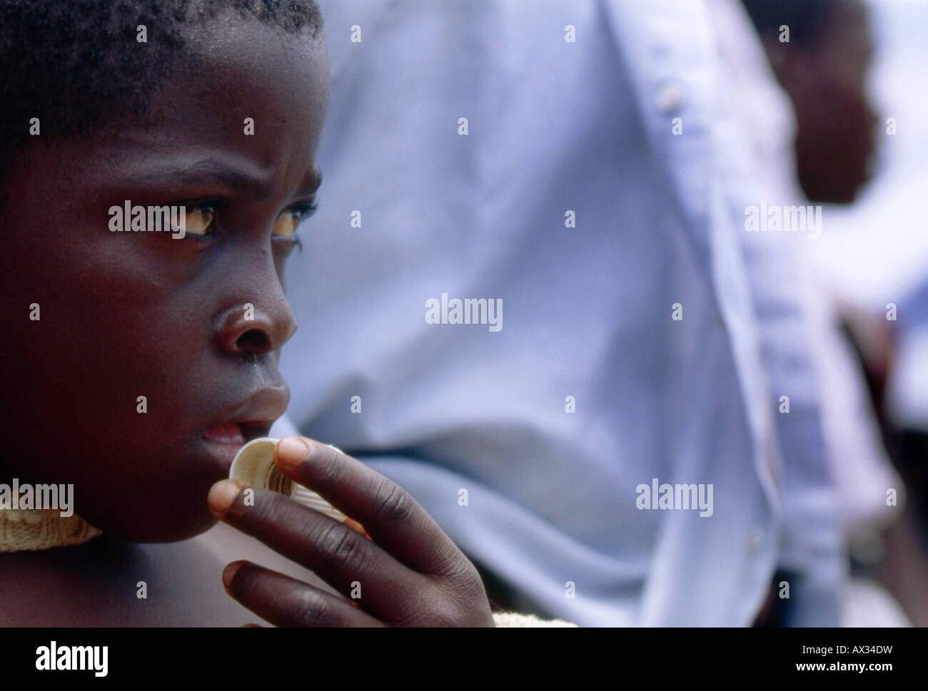 Refugee child from democratic republic of congo waiting to be ...