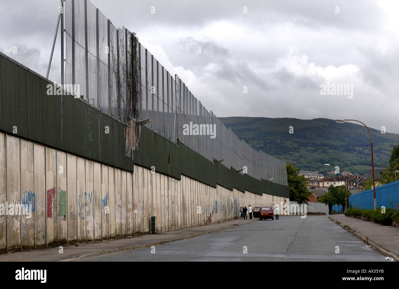 The barrier wall in Belfast that separates the Protestant community of ...