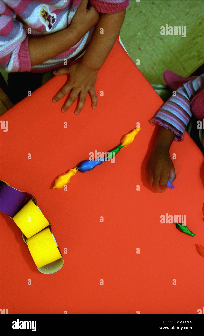 Children linking hands hi-res stock photography and images - Alamy