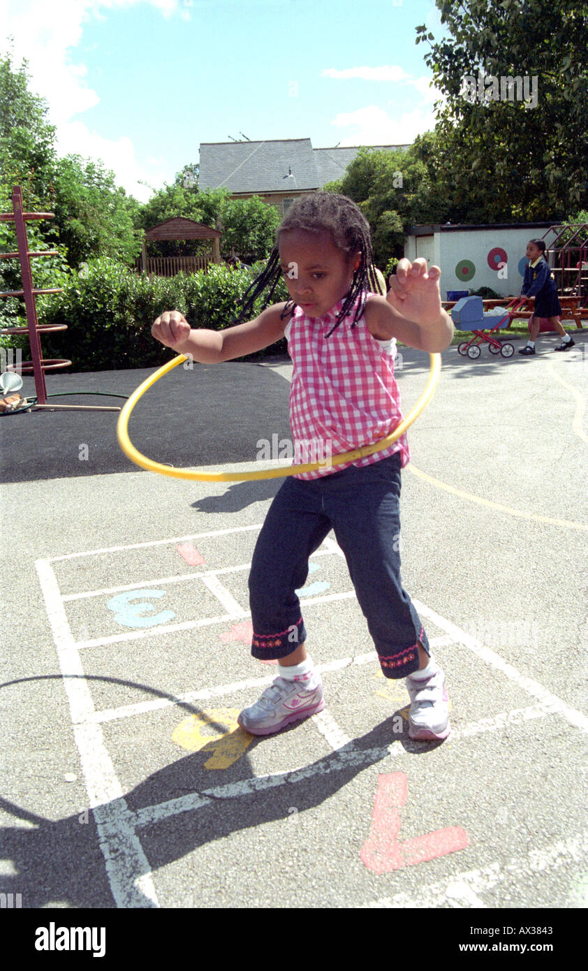 Children playing hula hoops hi-res stock photography and images - Alamy