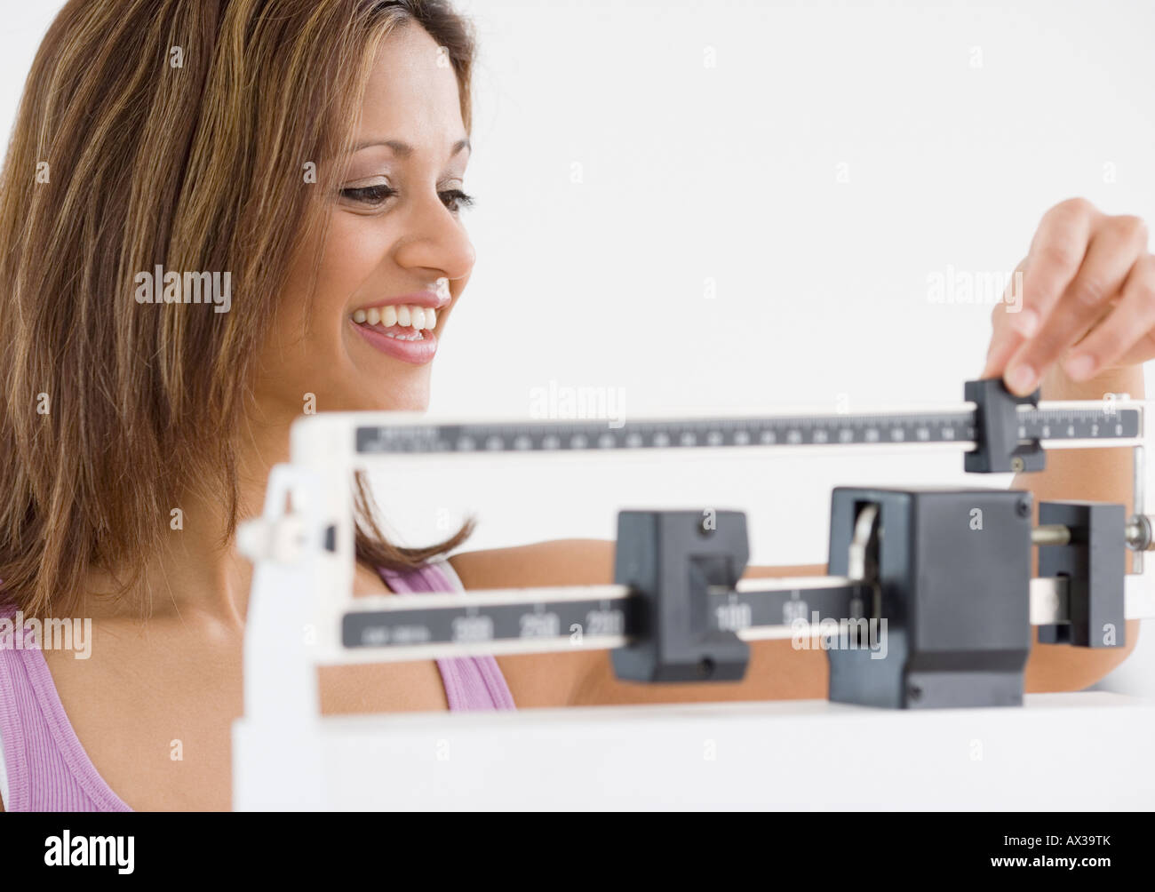 Indian woman on scale Stock Photo - Alamy