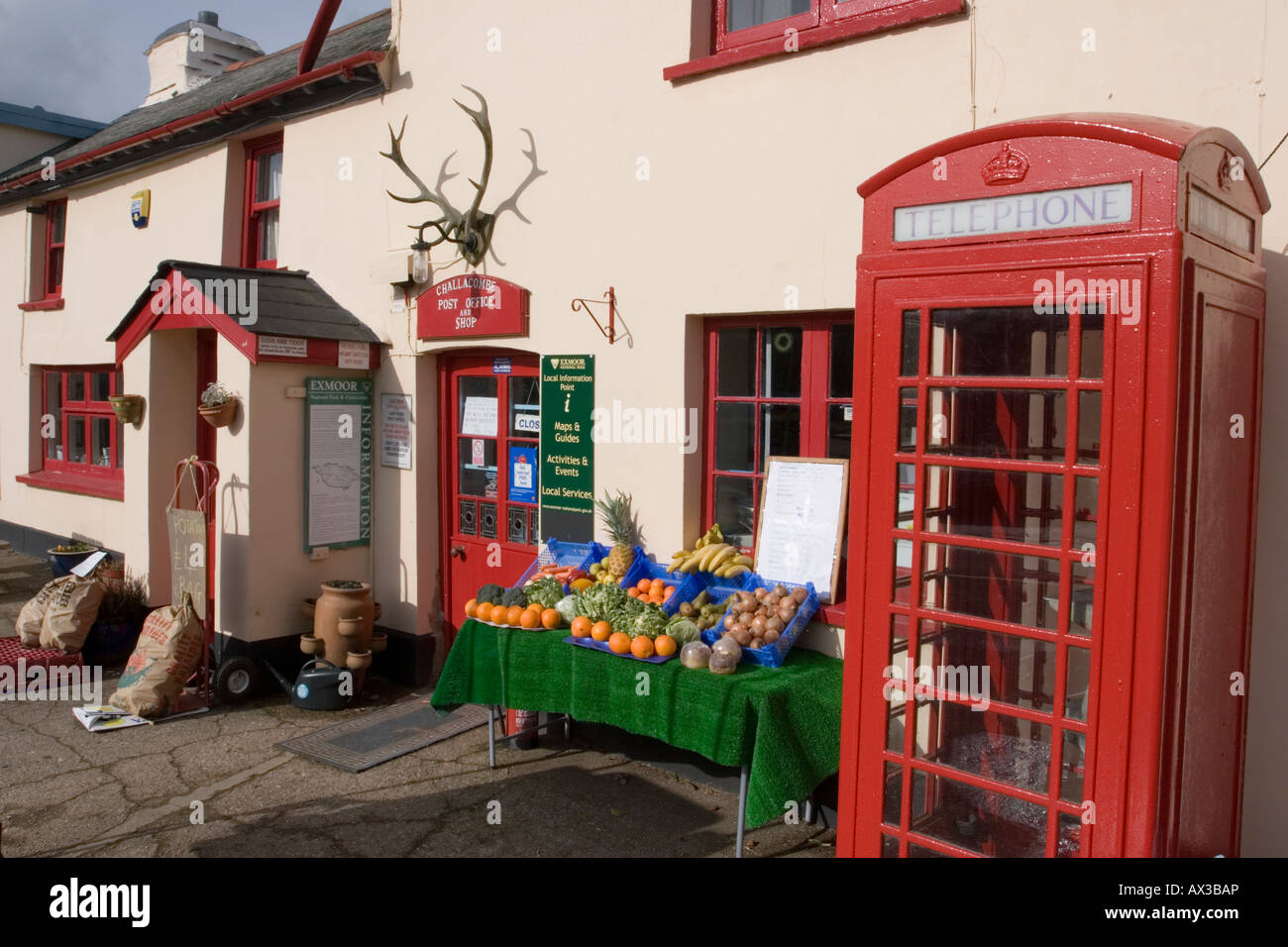 Old-fashioned telephone box and rural post office Stock Photo - Alamy