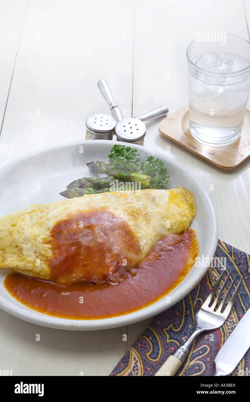 Omelet containing fried rice Stock Photo - Alamy