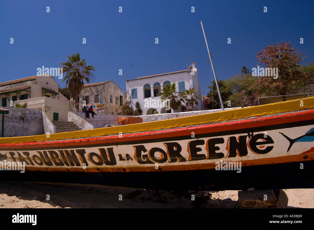 Travel, Senegal, Dakar, La Goree, Beachfront buildings and fishing boat ...