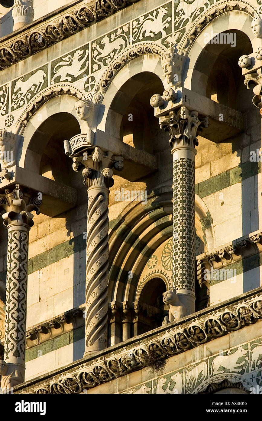 Intricate stonework on pillars and arches of a Cathedral in Luca, Italy ...