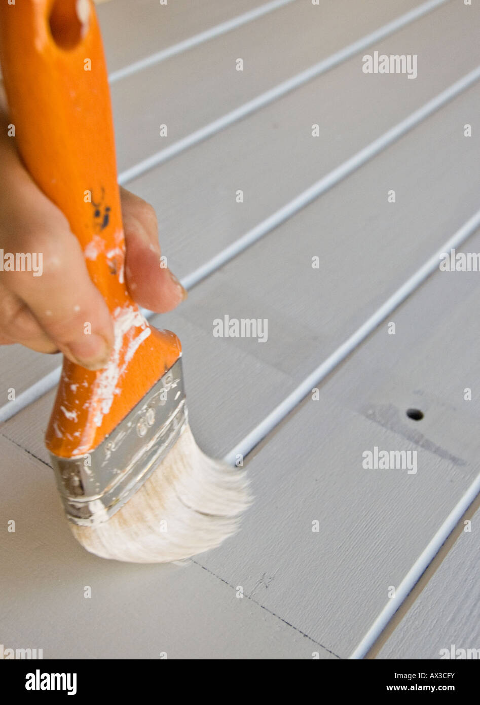 A paintbrush in action Stock Photo - Alamy