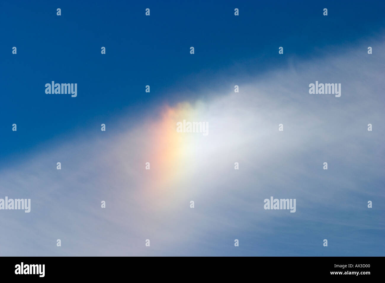 Halo refraction in clouds Germany Stock Photo - Alamy