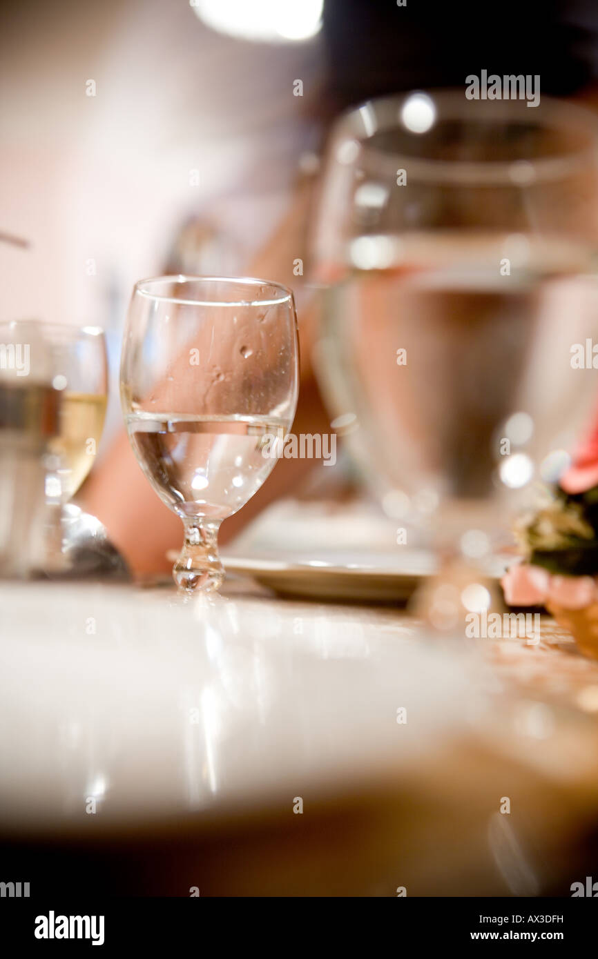 a glass of water on a setted table Stock Photo - Alamy