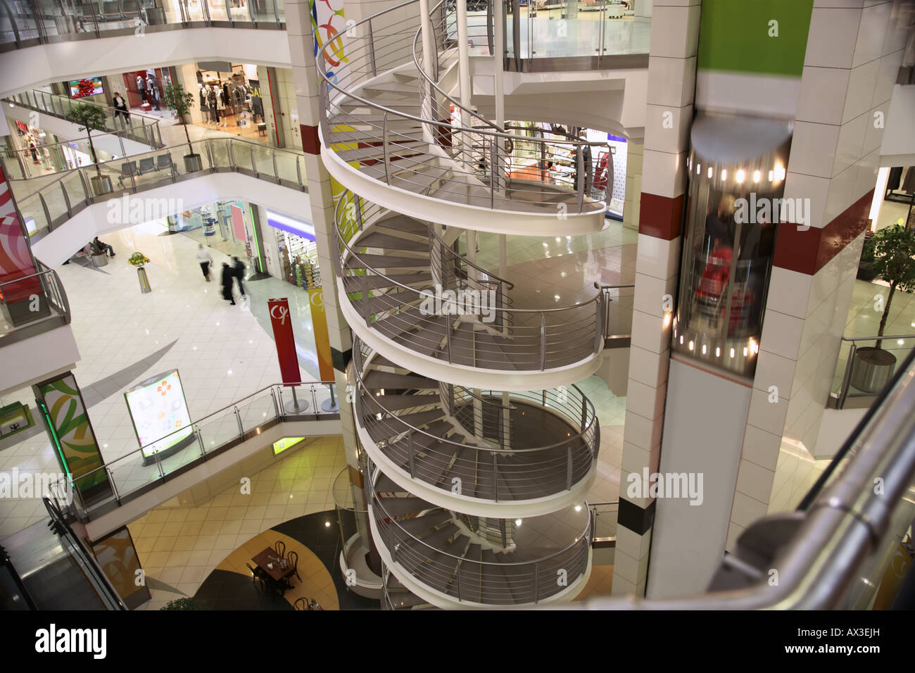 Spiral escalator shopping mall hi-res stock photography and images - Alamy